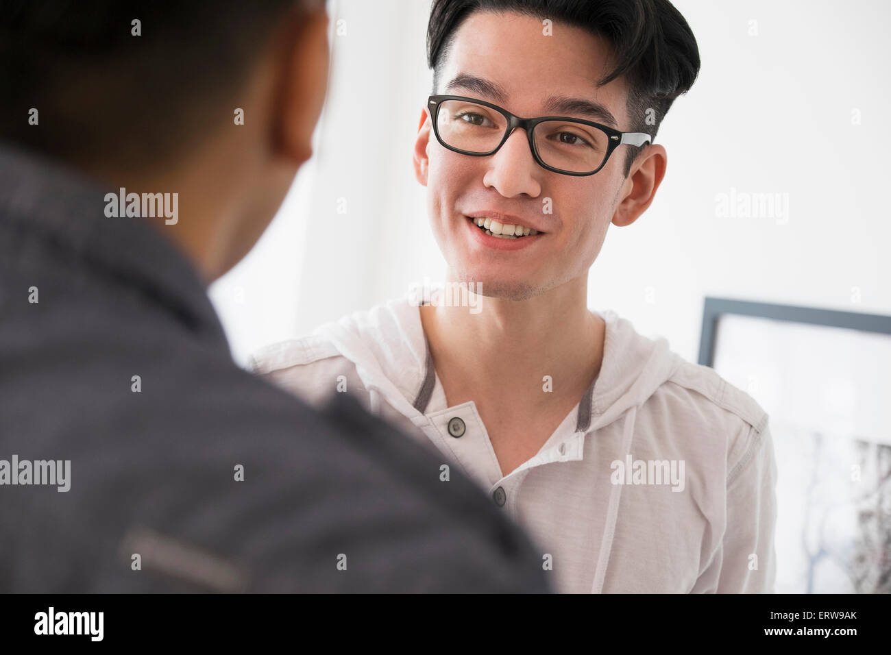 Smiling men hi-res stock photography and images - Alamy