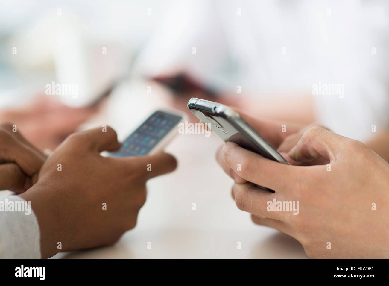 Women text messaging on phones hi-res stock photography and images - Alamy