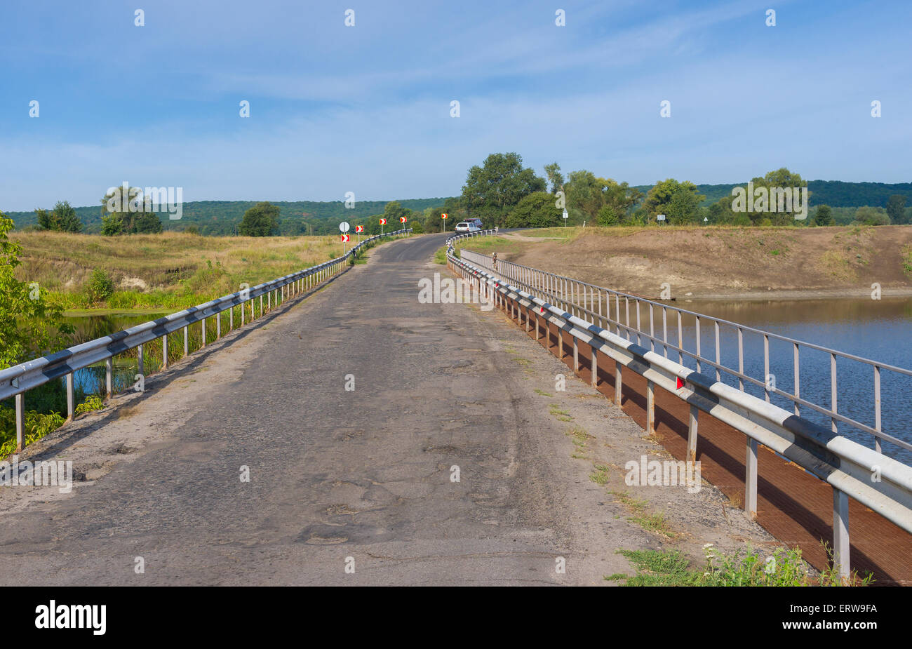 Landscape with old bridge over Vorskla river in Poltavskaya oblast ...
