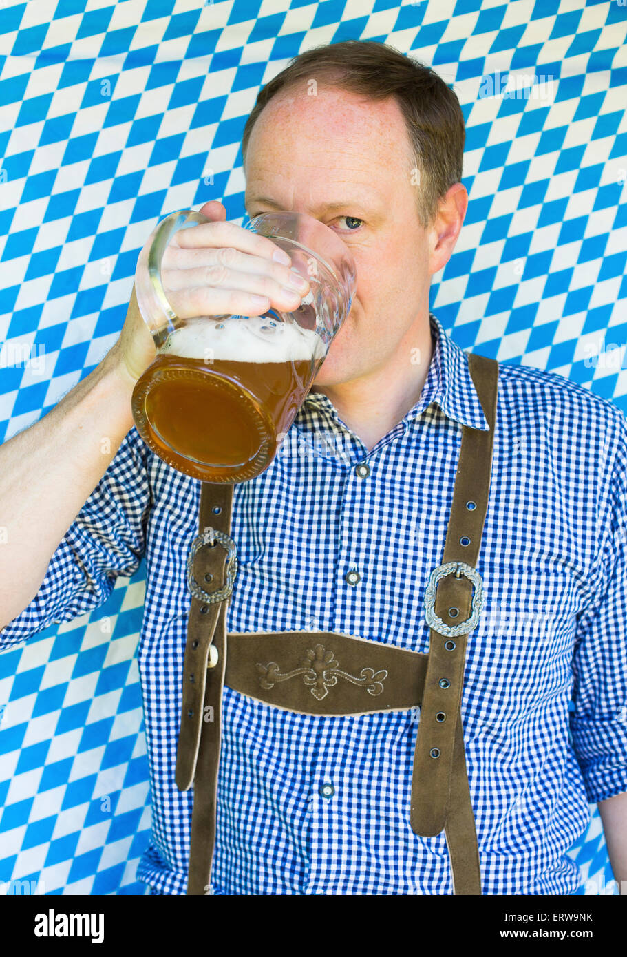 portrait of a bavarian man drinking beer Stock Photo - Alamy