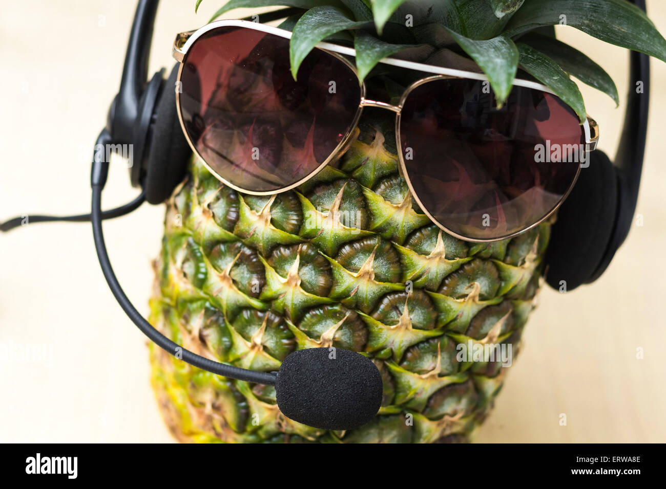 Cool pineapple with sunglasses and headset in summer themed photo Stock ...