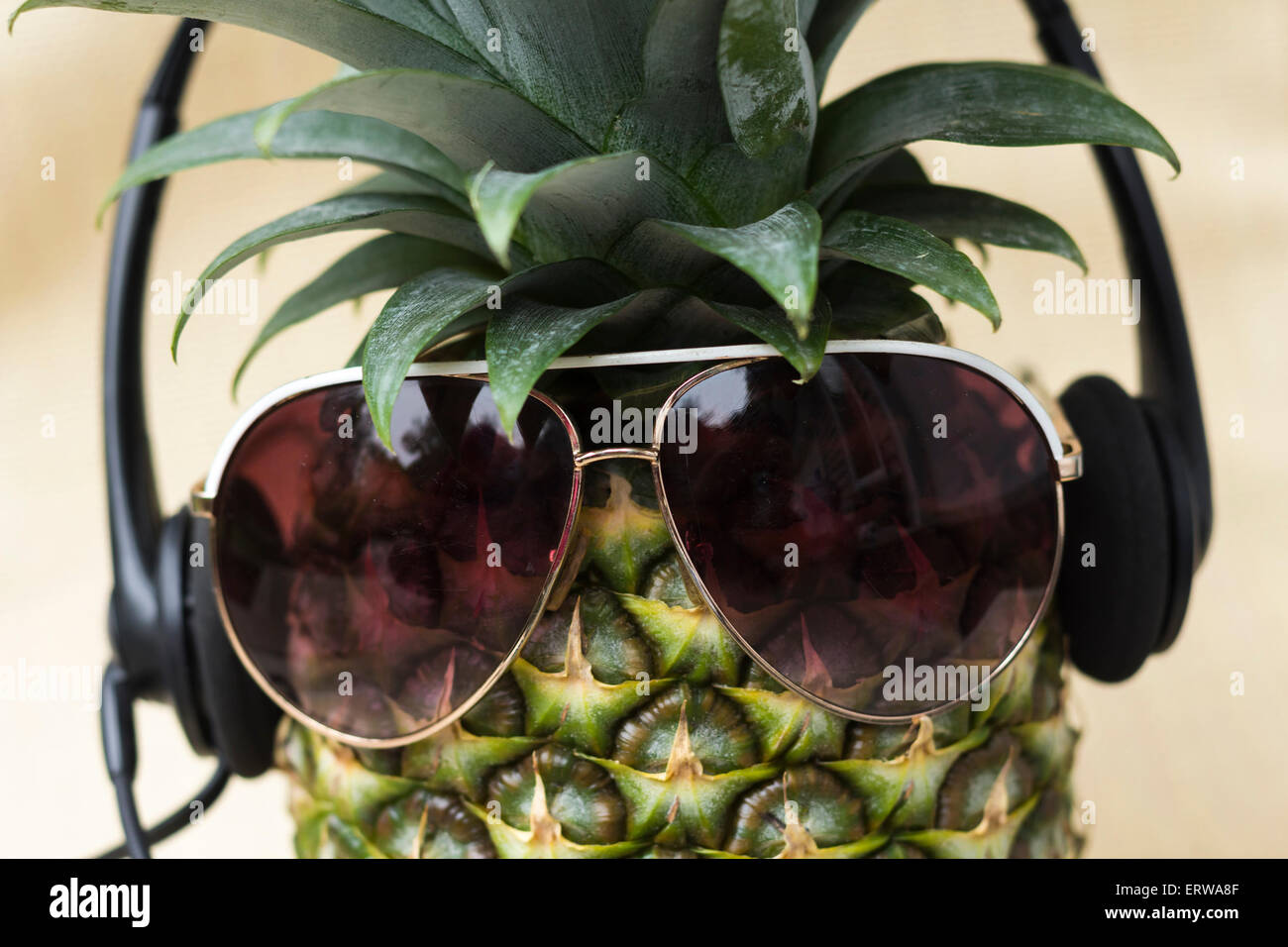 Cool pineapple with sunglasses and headset in summer themed photo Stock ...