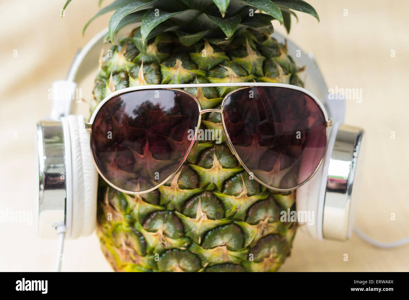 Cool pineapple with sunglasses and headphones in summer themed photo ...