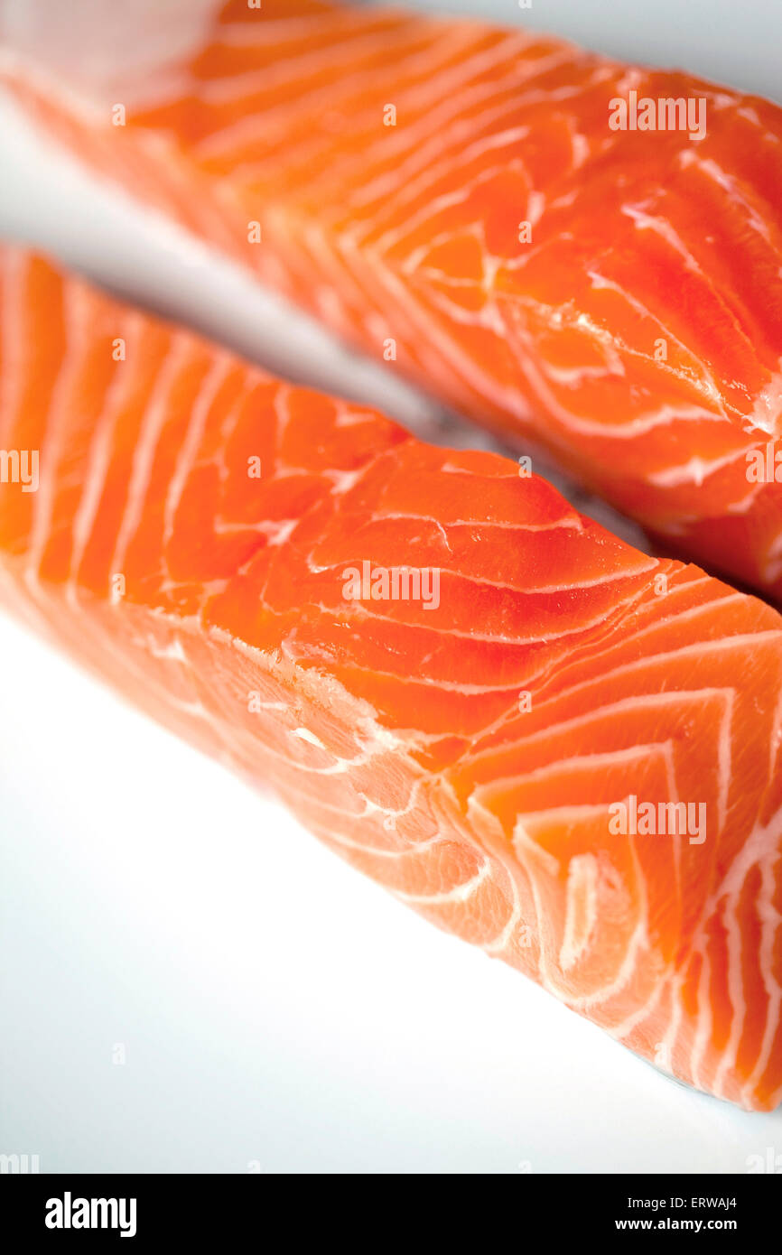 Two pieces of raw salmon before cooking Stock Photo - Alamy