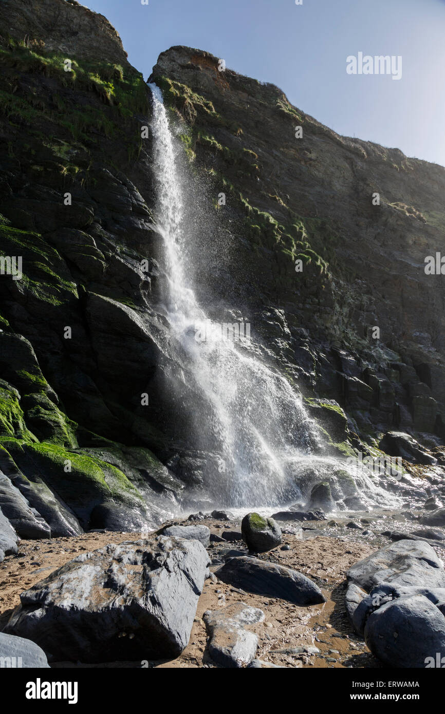 Waterfall at Tresaith Beach, Ceredigion, Wales Stock Photo - Alamy