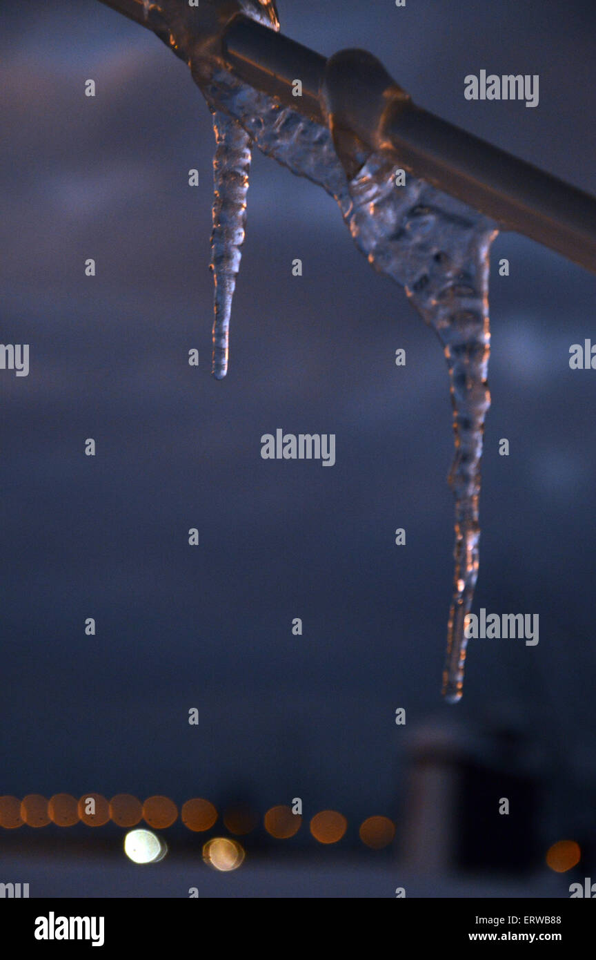 icicles on a flagpole with little light Stock Photo - Alamy