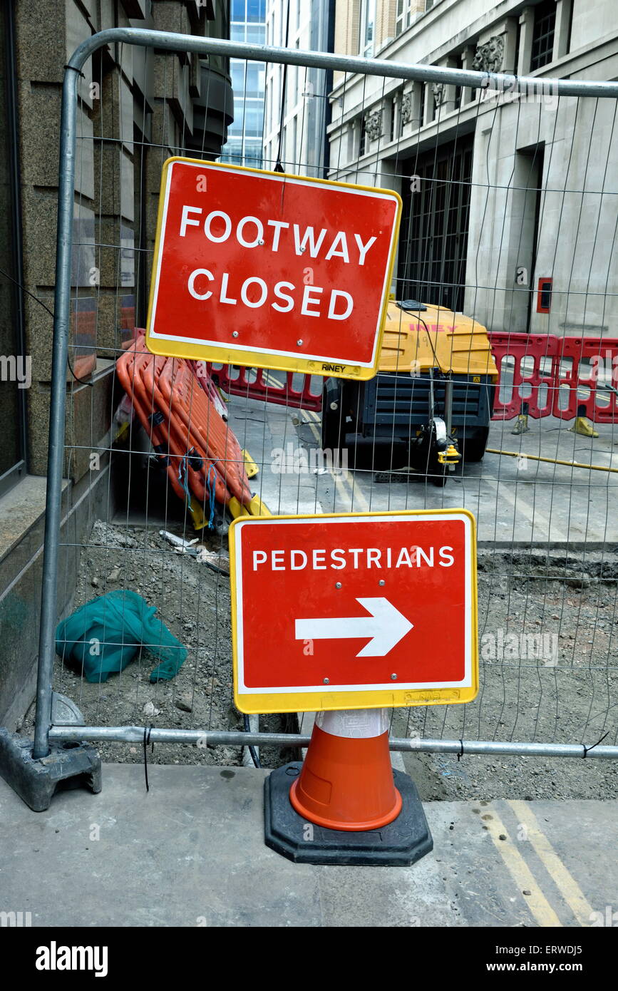 Footway closed sign with arrowed sign redirecting pedestrians hi-res ...