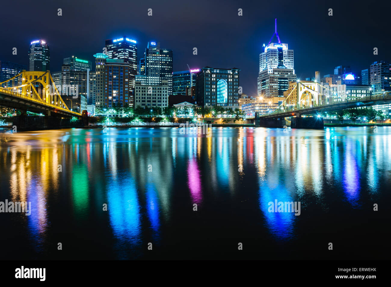 The Pittsburgh skyline reflecting in the Allegheny River at night, seen ...