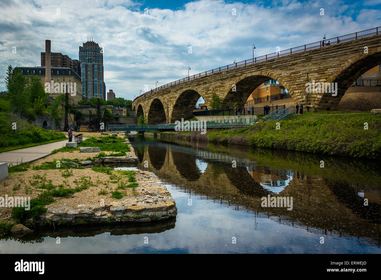 The Stone Arch Bridge and Mill Ruins Park, in Minneapolis, Minnesota ...