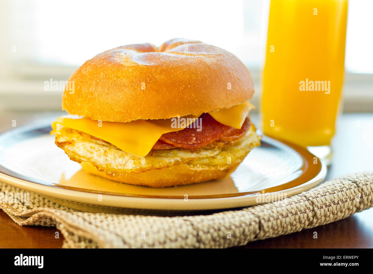 Taylor ham, pork roll, egg and cheese breakfast sandwich on a kaiser ...