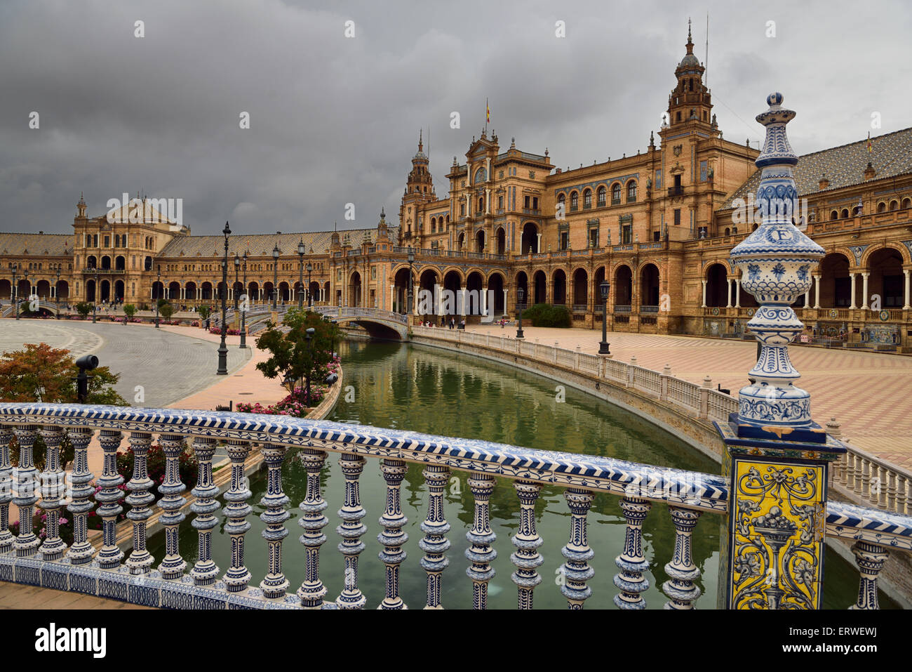Main building from a bridge with painted ceramic railing over the canal ...