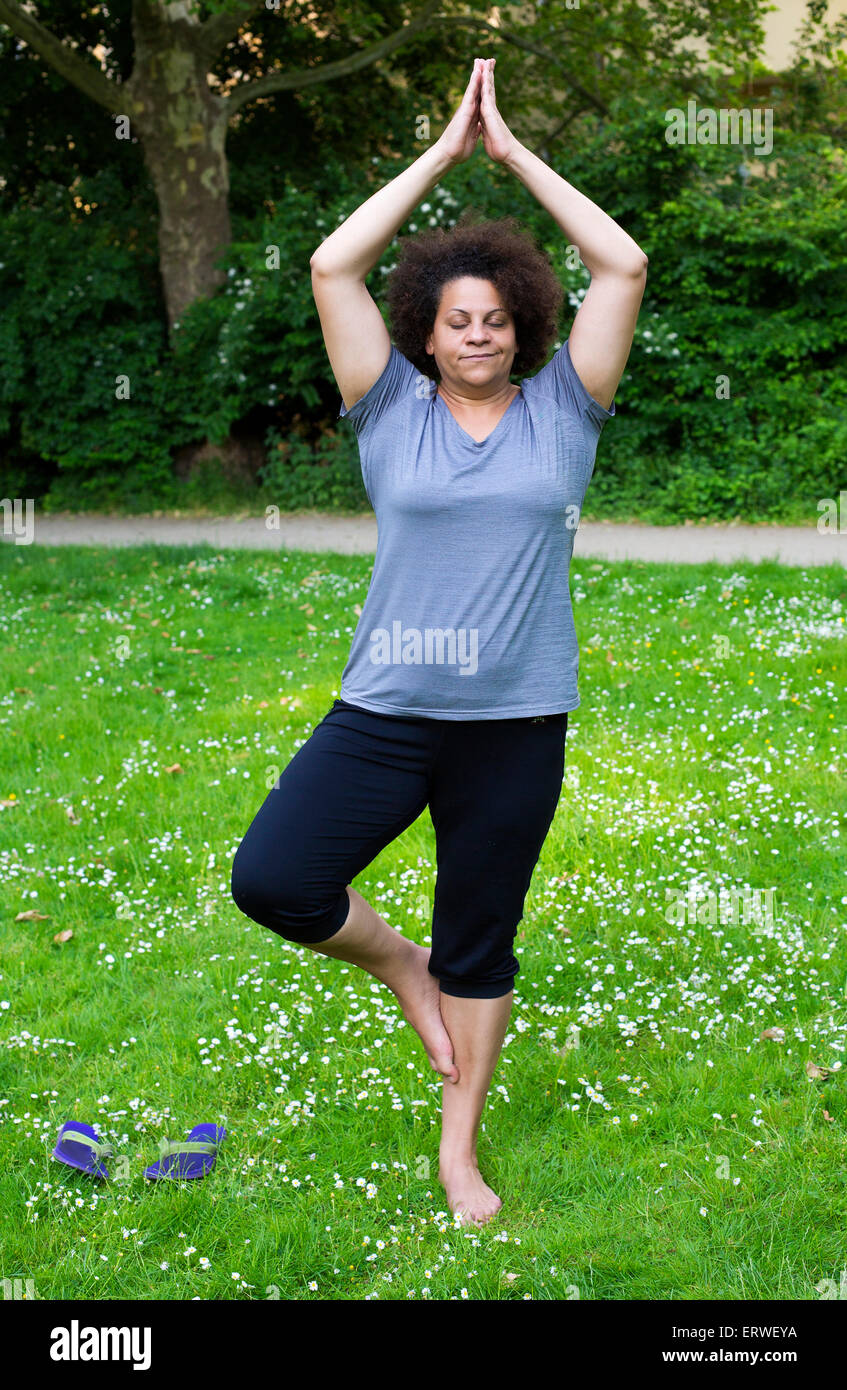 African american woman doing yoga hi-res stock photography and images ...