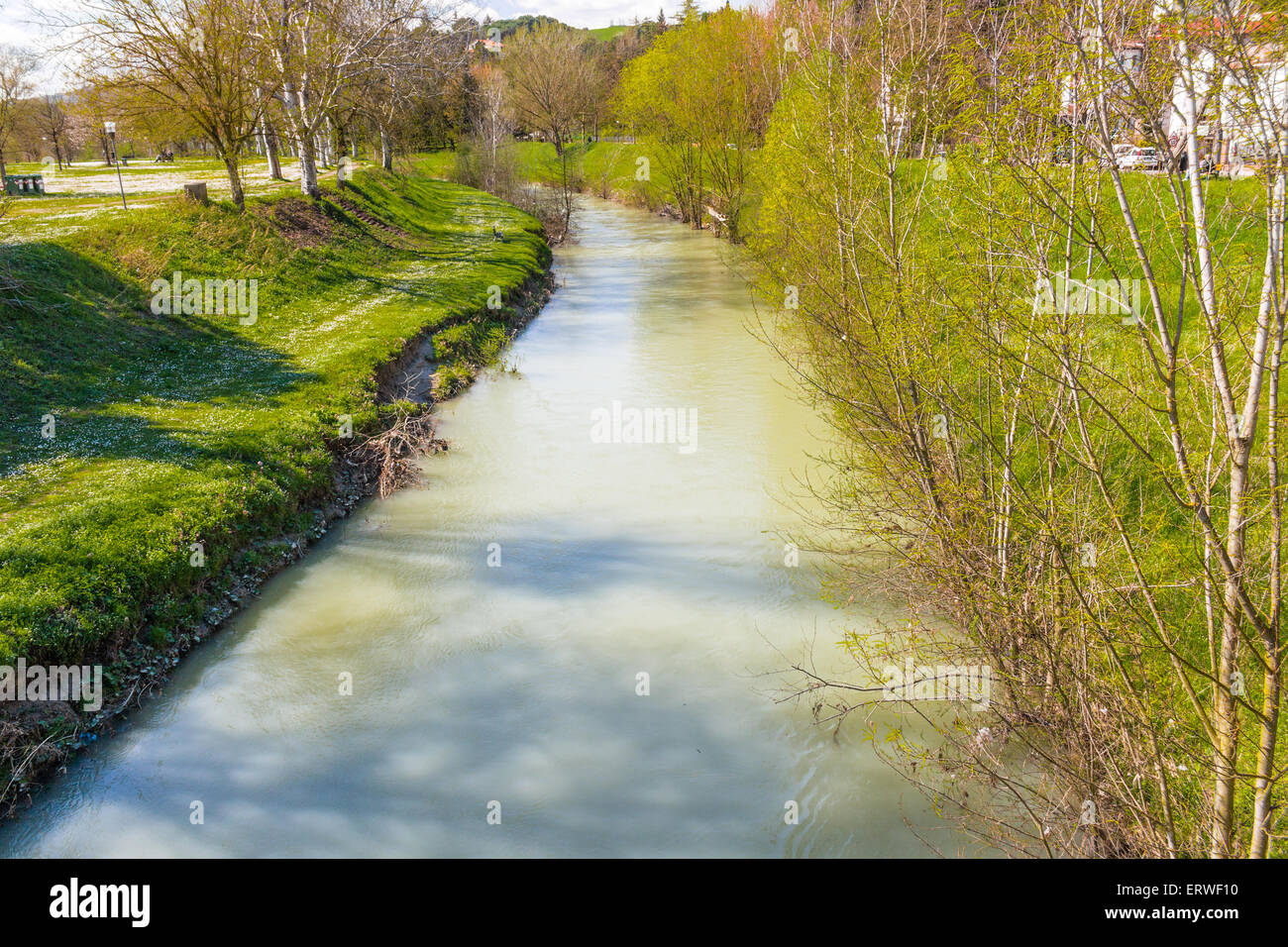 The tranquility of a quiet river in the countryside of the hills during ...