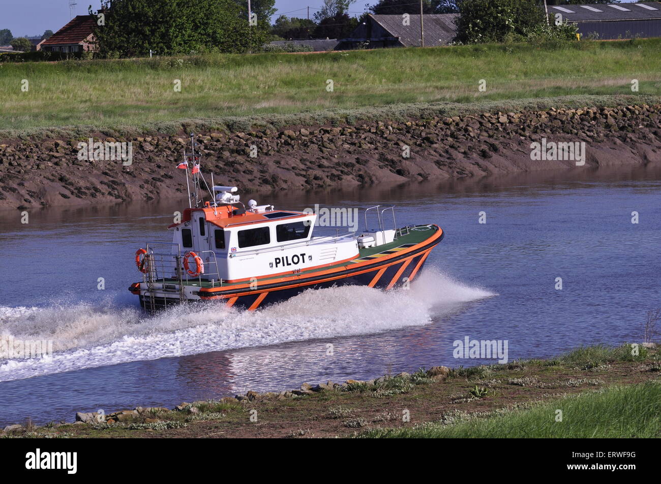 Pilot boat on the River Nene going to a ship intending to enter Port ...