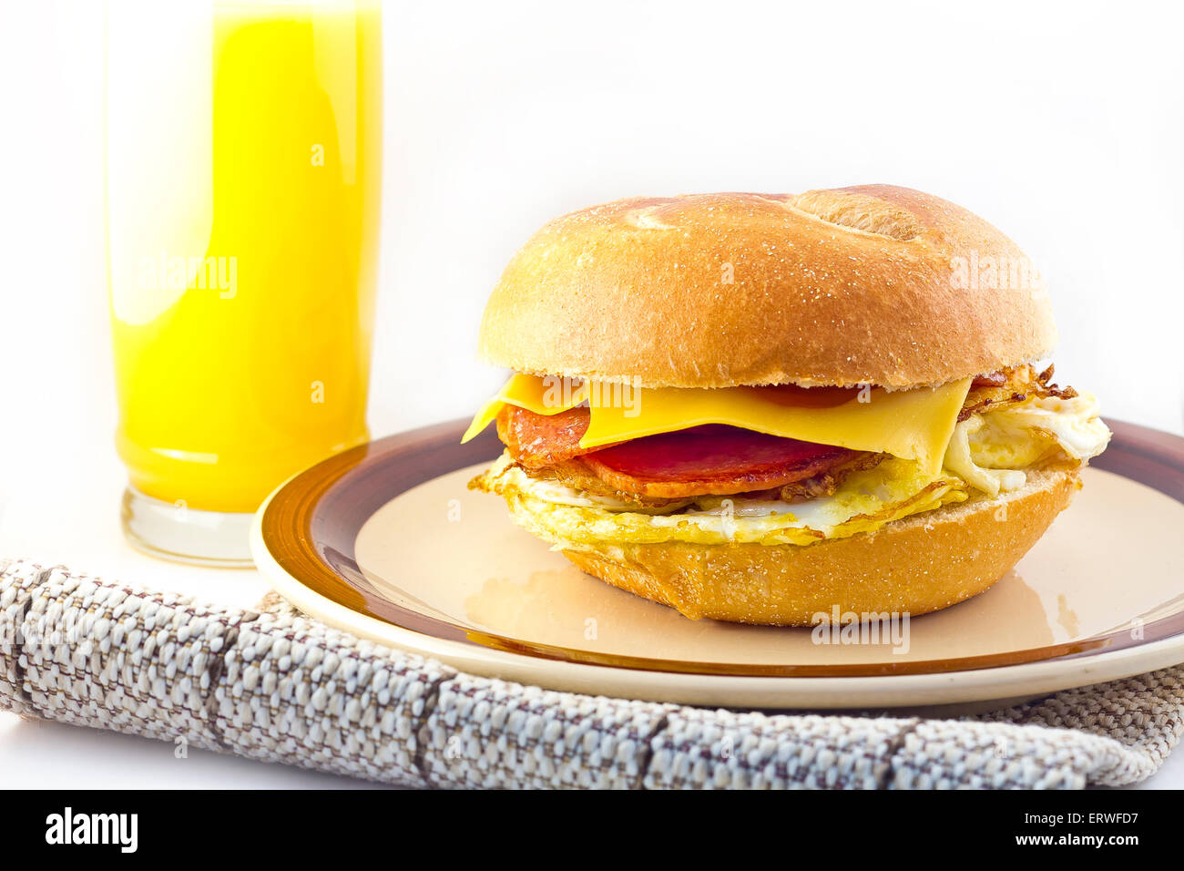 Taylor ham, pork roll, egg and cheese breakfast sandwich on a kaiser ...