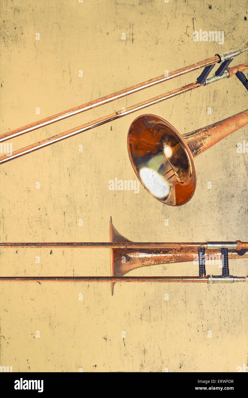 Rusty Trombones in grunge style textured musical background Stock Photo ...