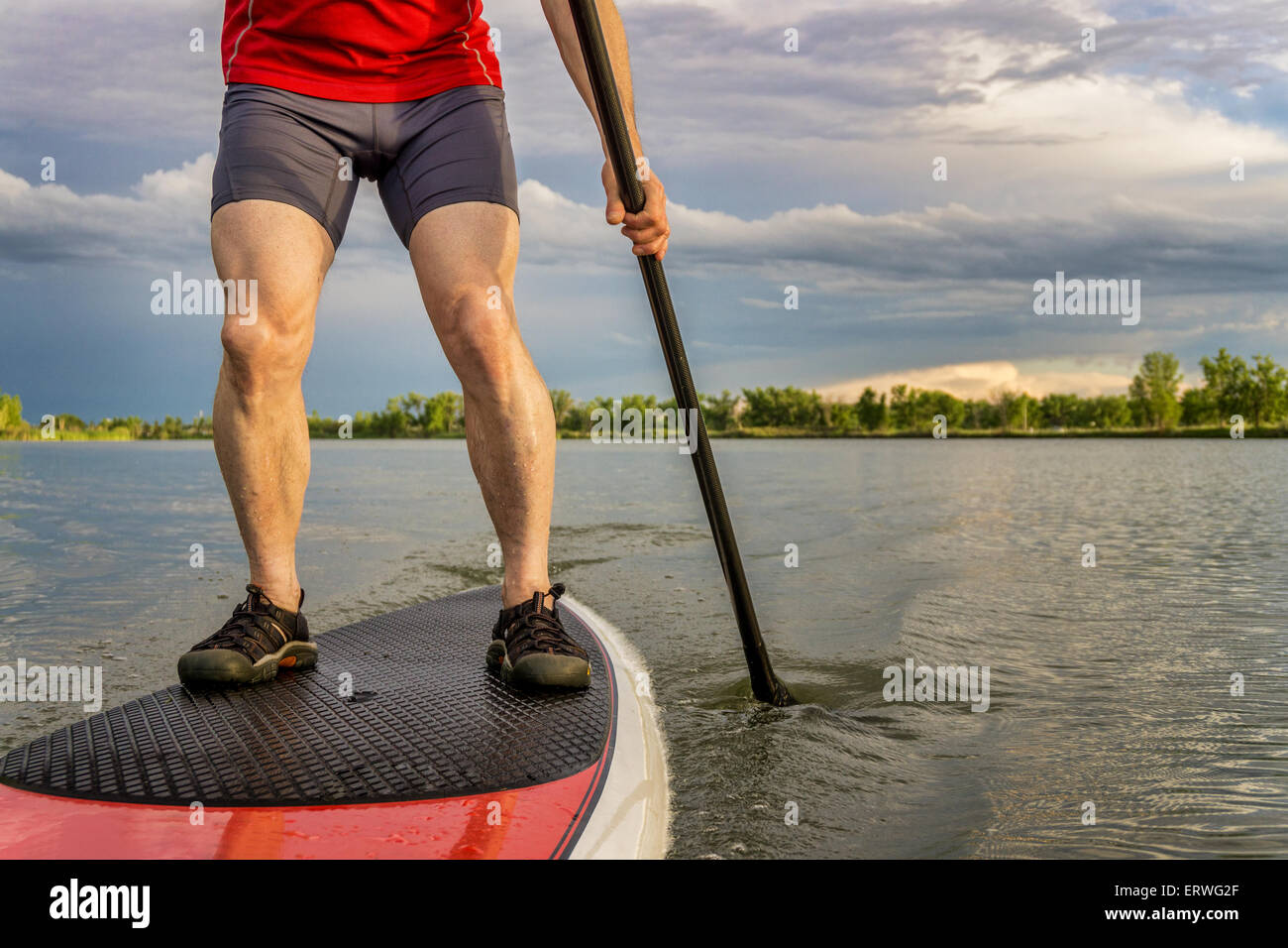 Legs on paddleboard hi-res stock photography and images - Alamy