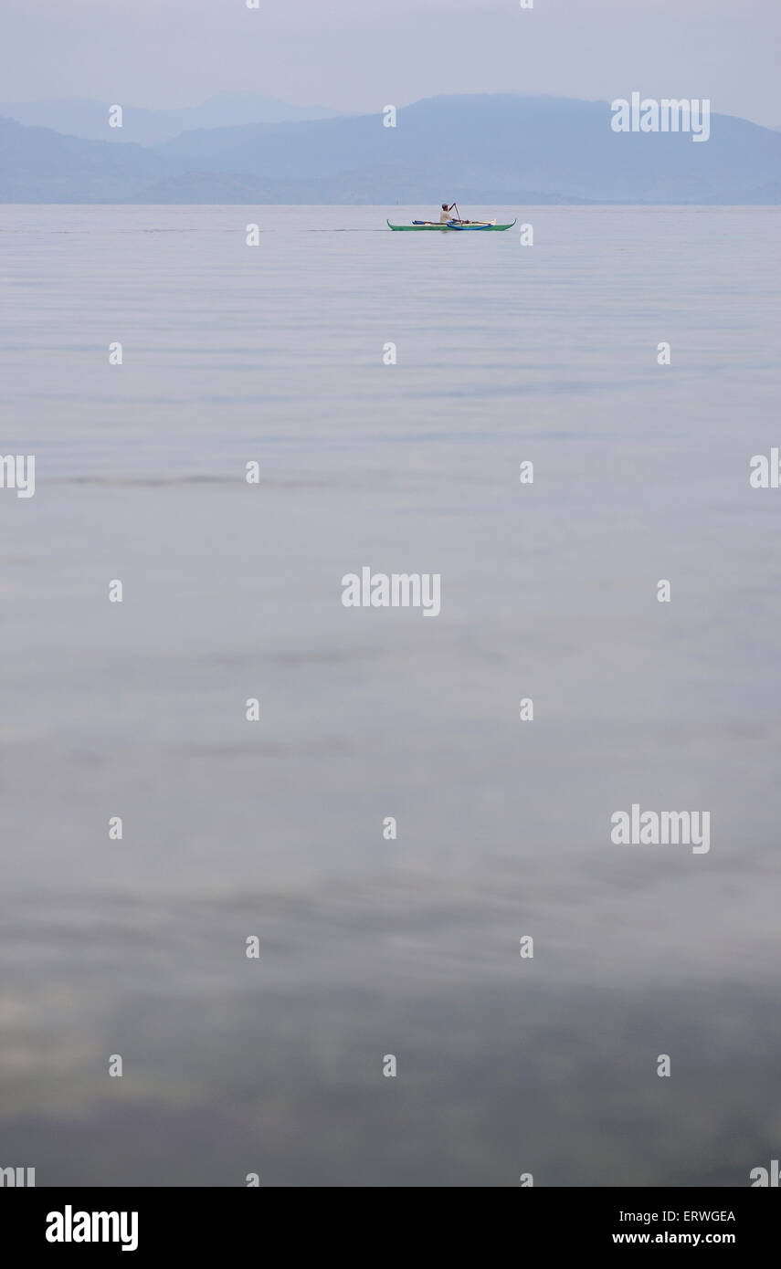 Fisherman early morning on Tanon Strait Panagsama Beach Moalboal Cebu ...