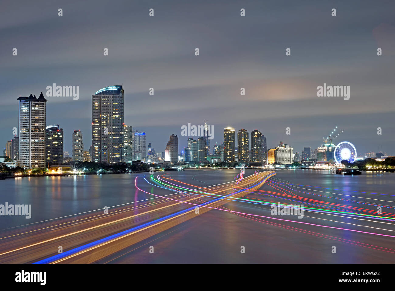 boat light trails on the river at twilight time Stock Photo - Alamy