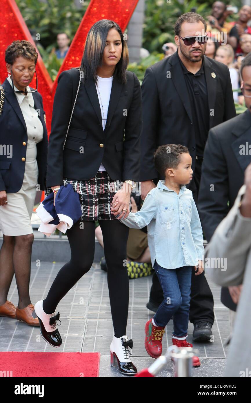 Pharrell Williams is presented with a star on the Hollywood walk of ...
