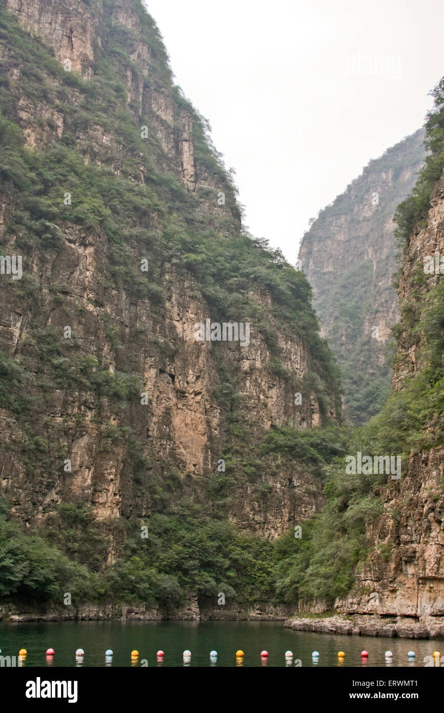Steep high cliffs and the river at the bottom of the gorge Stock Photo ...