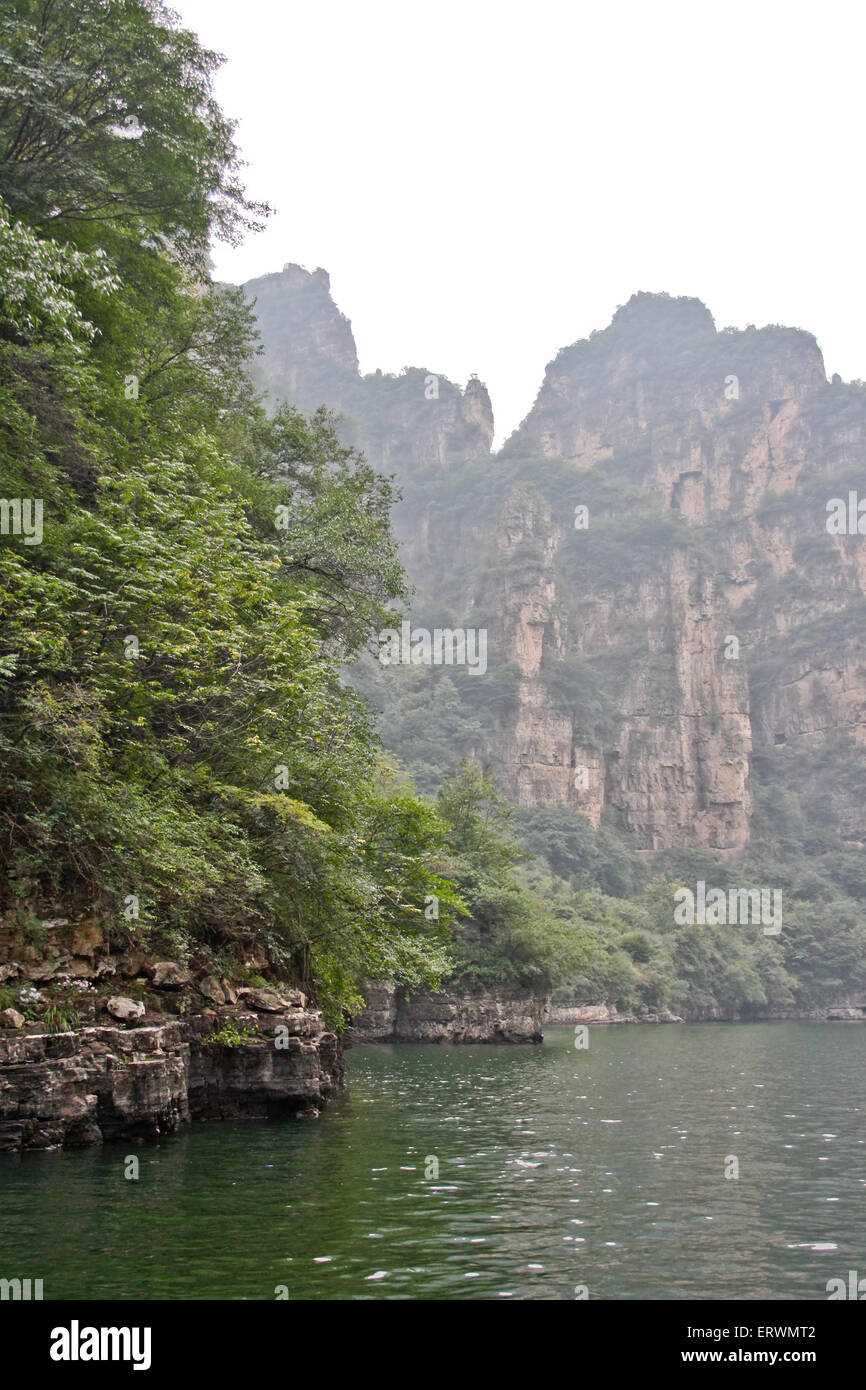 Steep high cliffs and the river at the bottom of the gorge Stock Photo ...