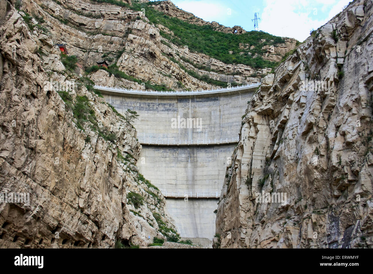 huge dam in huge rocks Stock Photo - Alamy