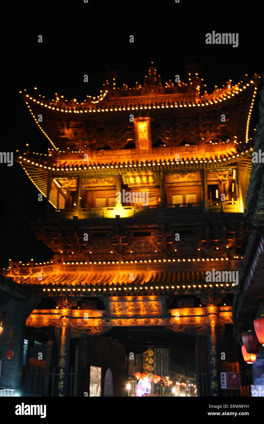 Bright night lights of the ancient Chinese city of Pingyao. China Stock ...