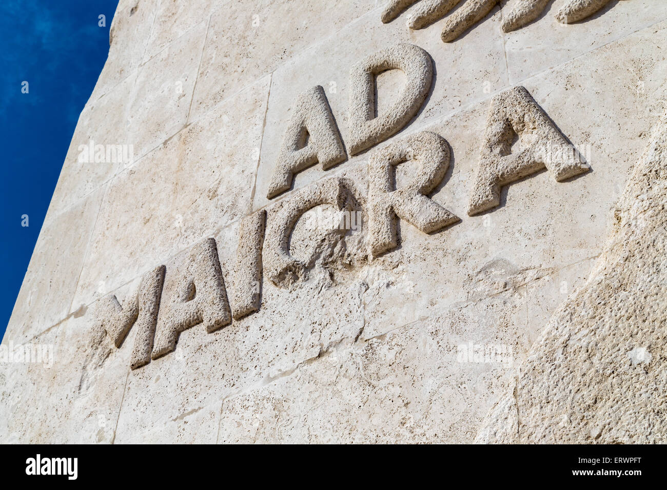 The latin sentence “Ad maiora” set in stone in capital letters, means ...