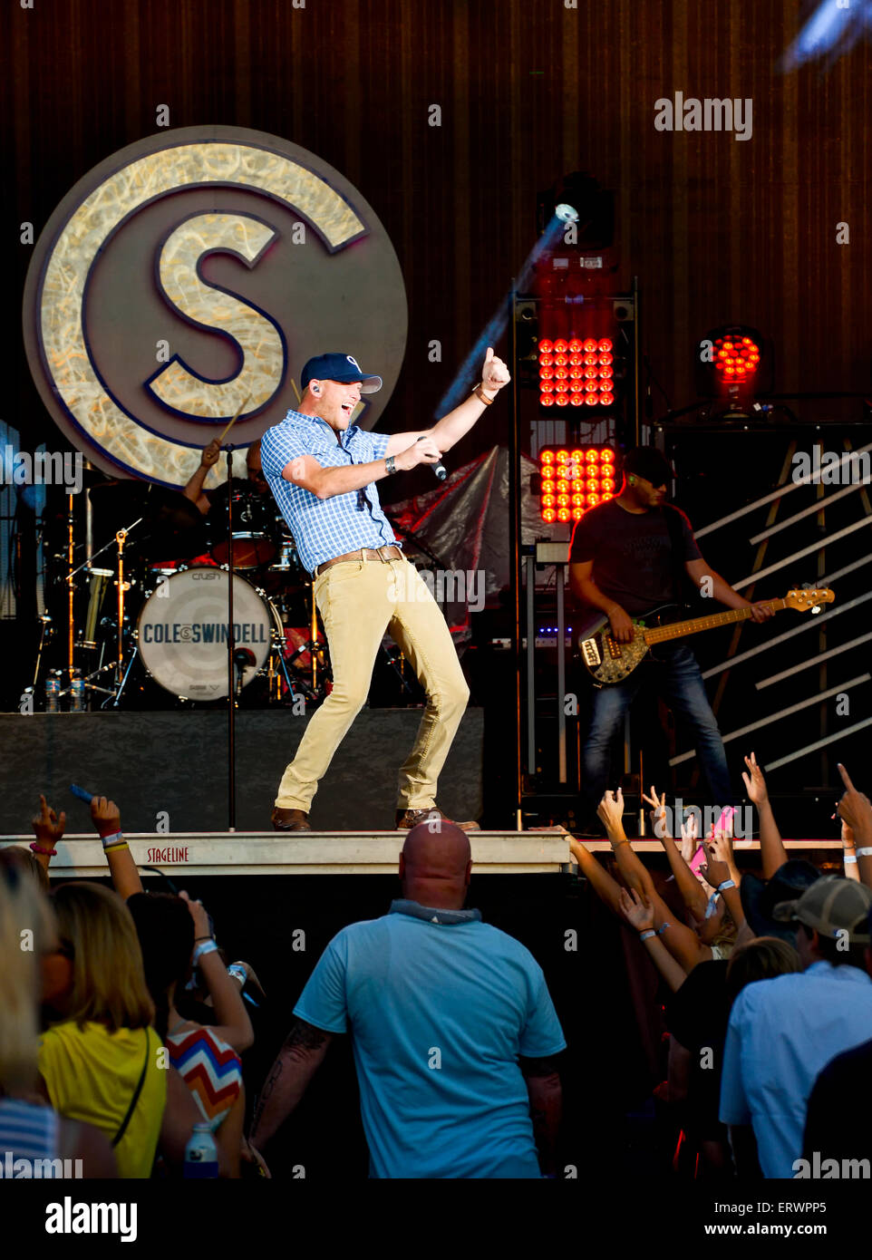 Cole Swindell performing at the Carolina Country Music Festival at ...