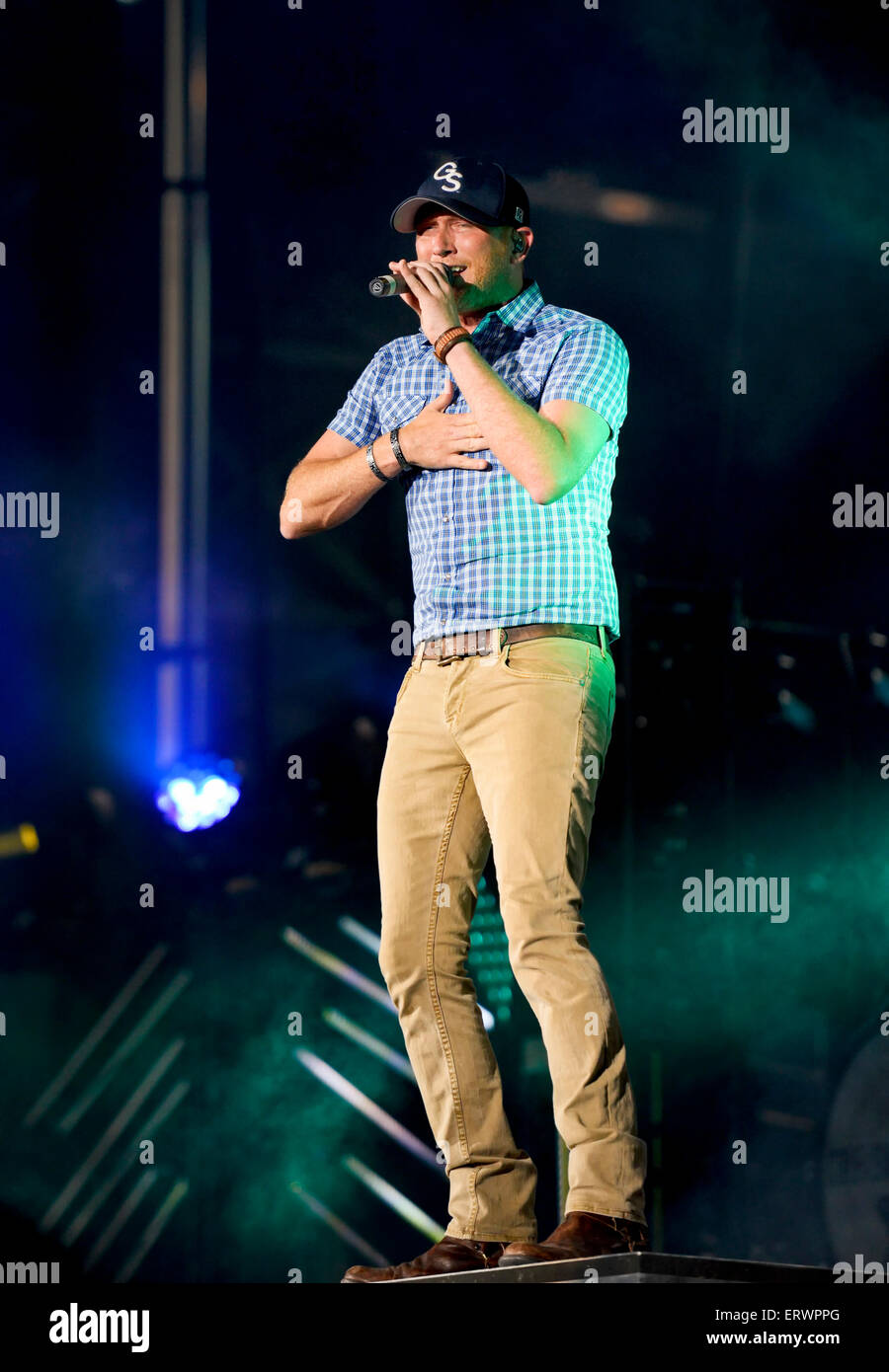 Cole Swindell performing at the Carolina Country Music Festival at ...