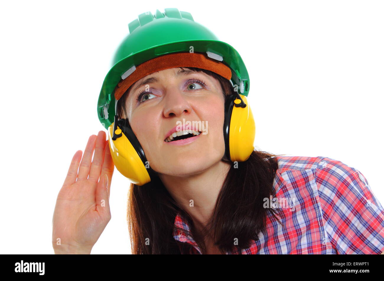 Female construction worker can not hear because wearing green helmet ...