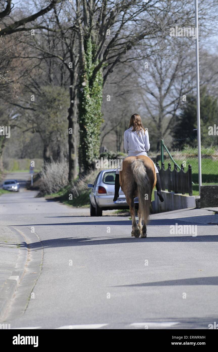 woman rides pony Stock Photo - Alamy