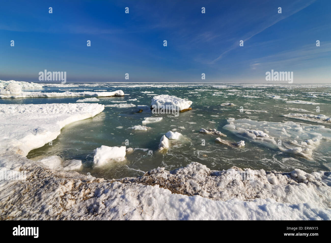 Frozen ice ocean coast and blue sky - polar winter Stock Photo - Alamy