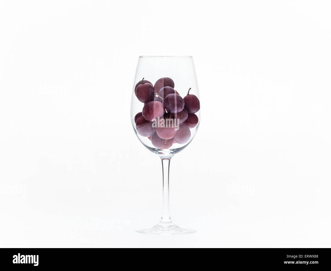 Red grapes in wine glass Stock Photo - Alamy