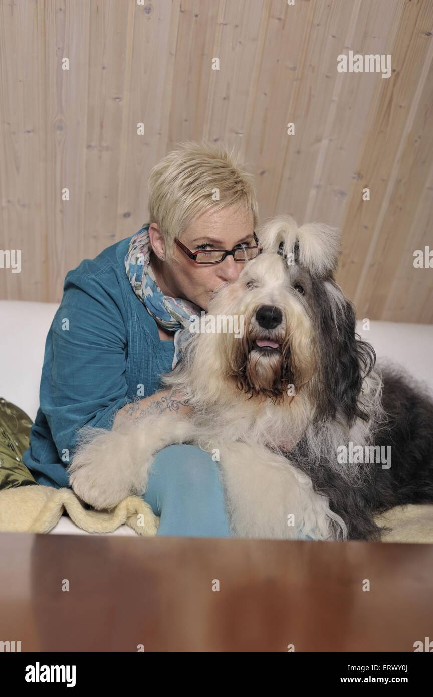 Woman with old english sheepdog hi-res stock photography and images - Alamy