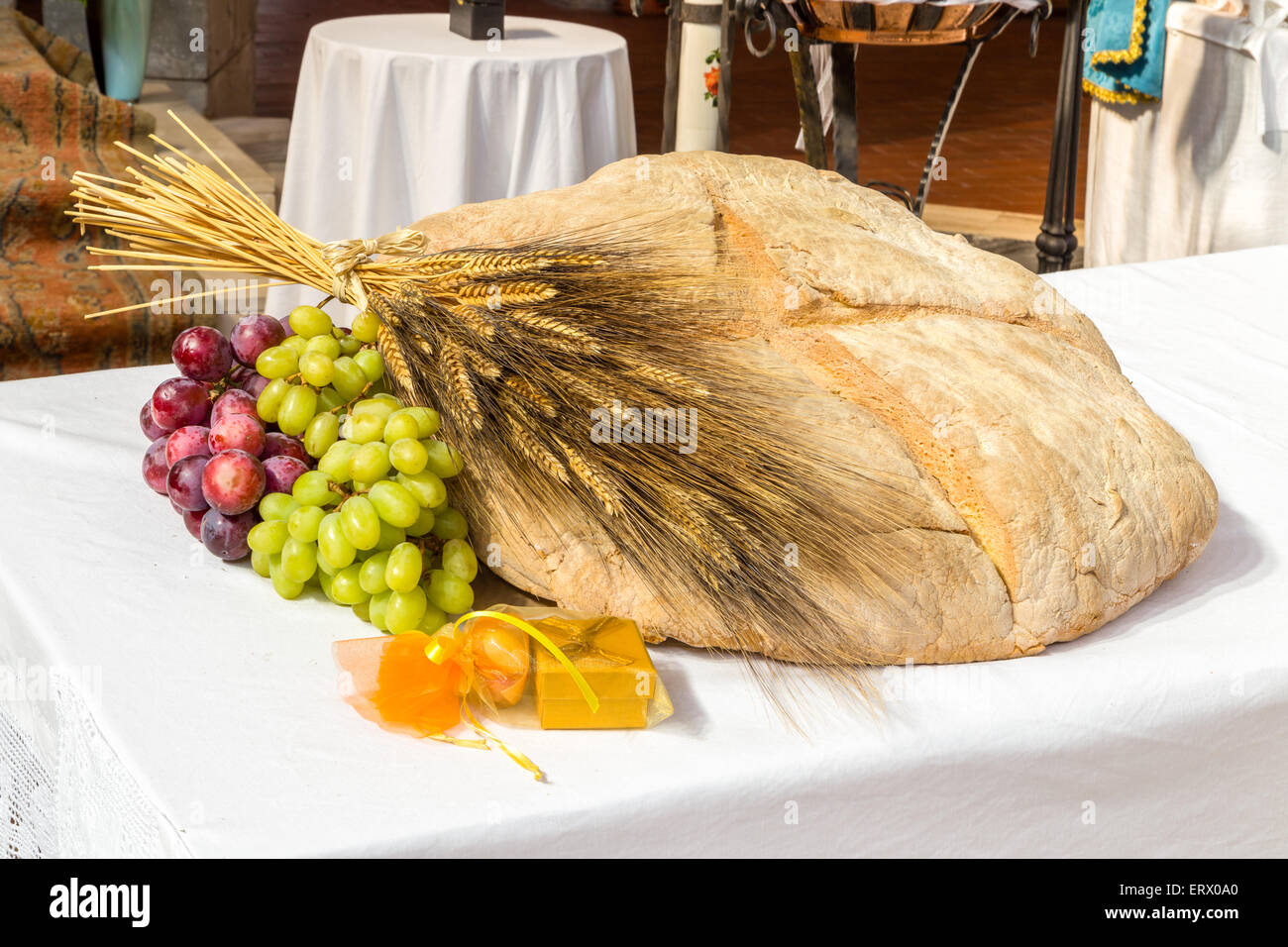 bread, grapes and wheat as a symbol of Christian Communion in a ...