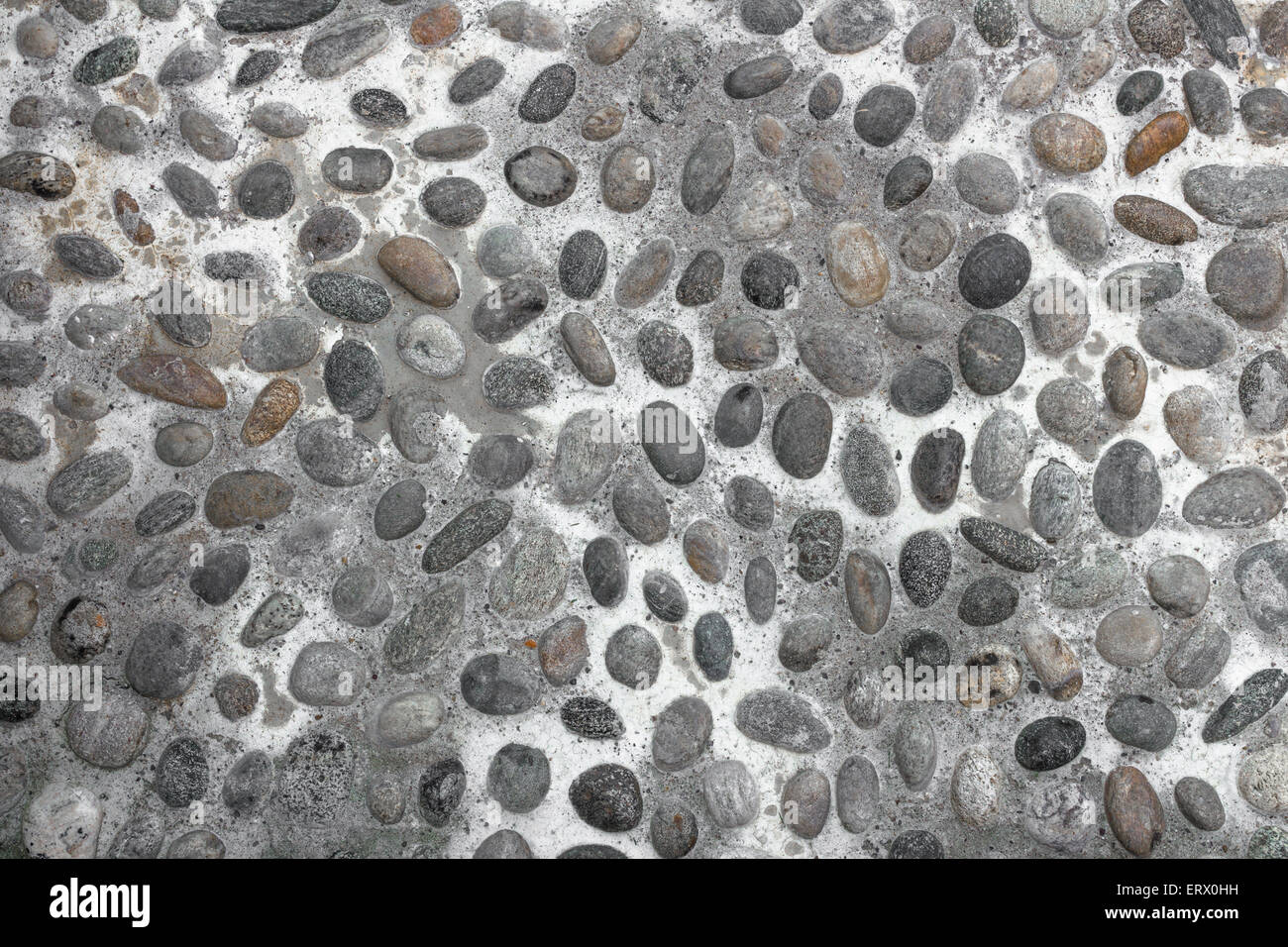 Flooring made of stones and pebbles with an irregular shape Stock Photo ...