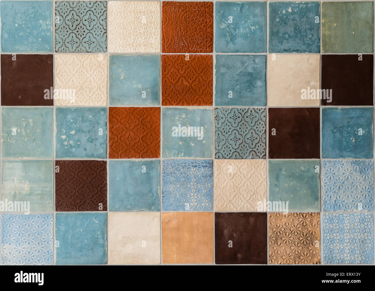 Colorful handmade tiles with rustic patterns Stock Photo - Alamy