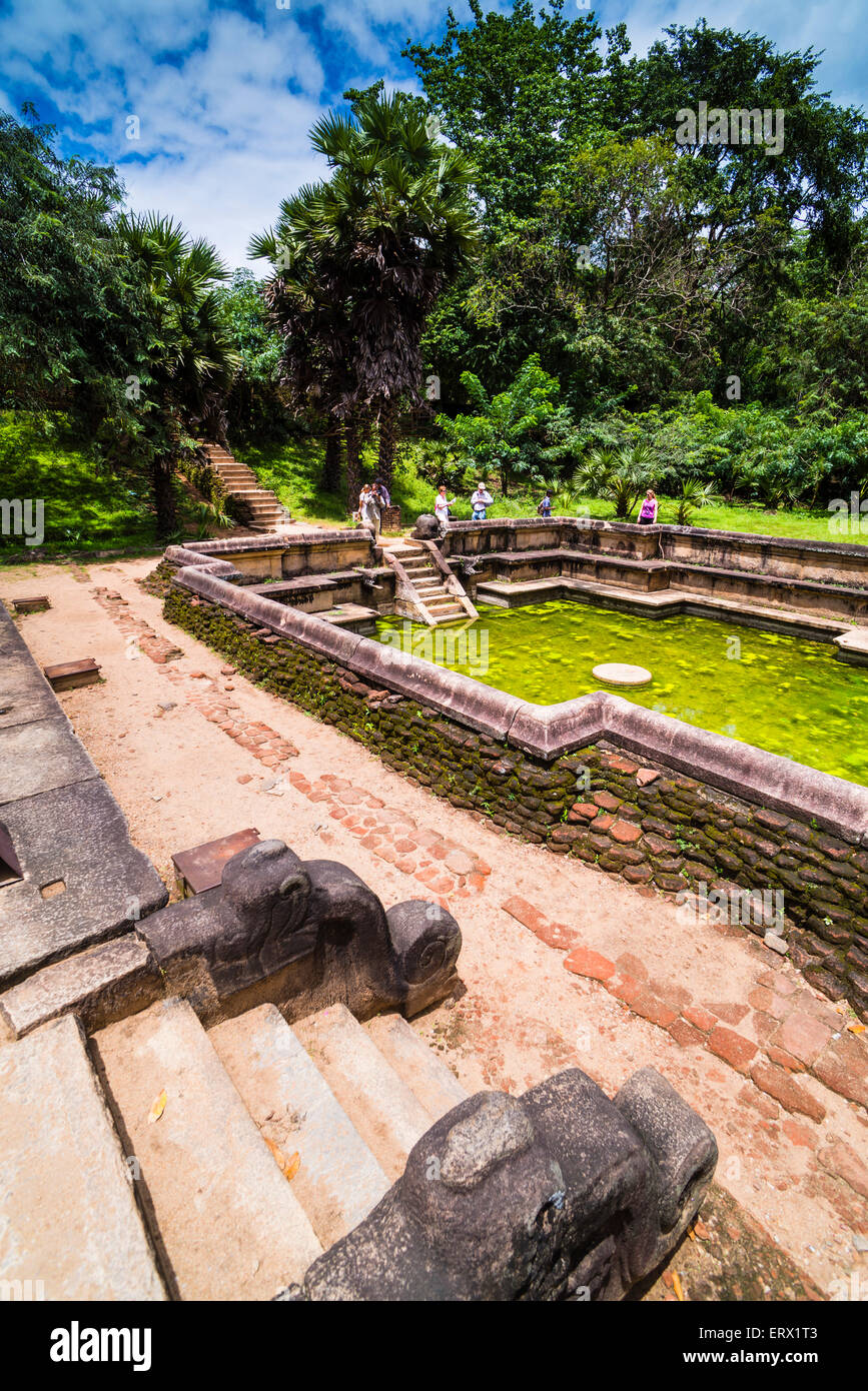Polonnaruwa Ancient City, tourists at the Bathing Pool (Kumara Pokuna ...