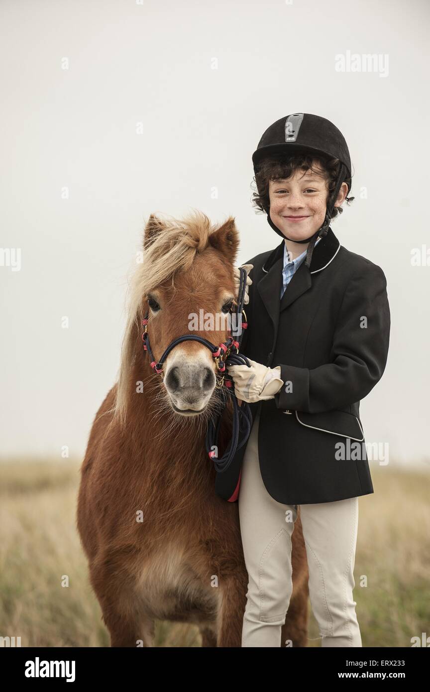 Child riding shetland pony hi-res stock photography and images - Alamy