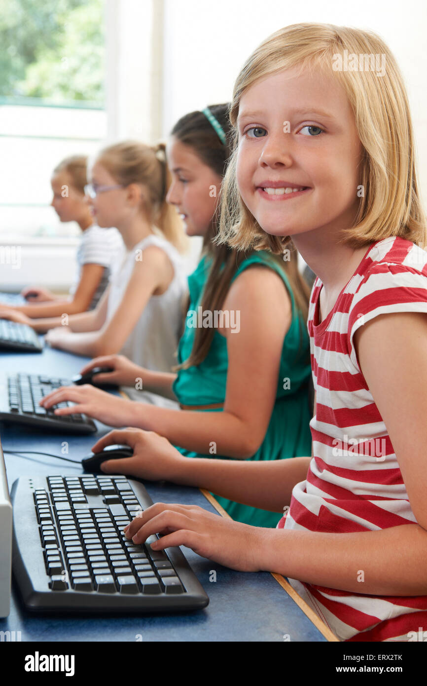 Group Of Female Elementary School Children In Computer Class Stock ...