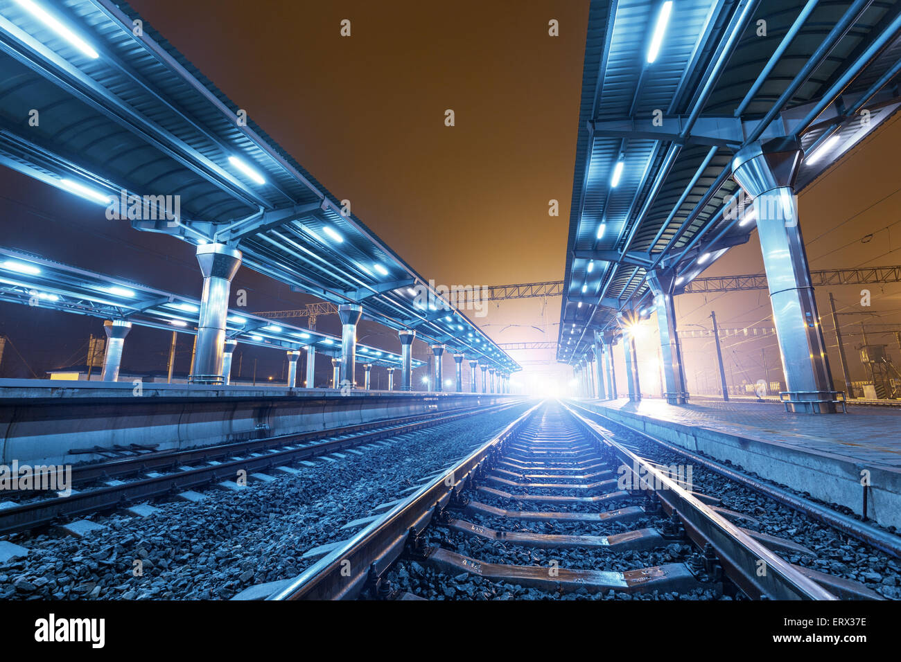 Railway station at night. Train platform in fog. Railroad in Donetsk ...