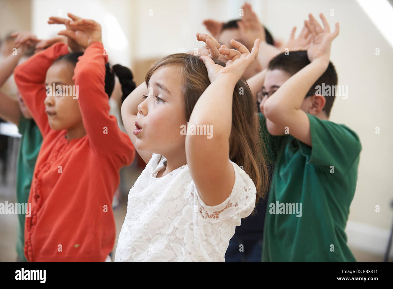 Group Of Children Enjoying Drama Class Together Stock Photo - Alamy