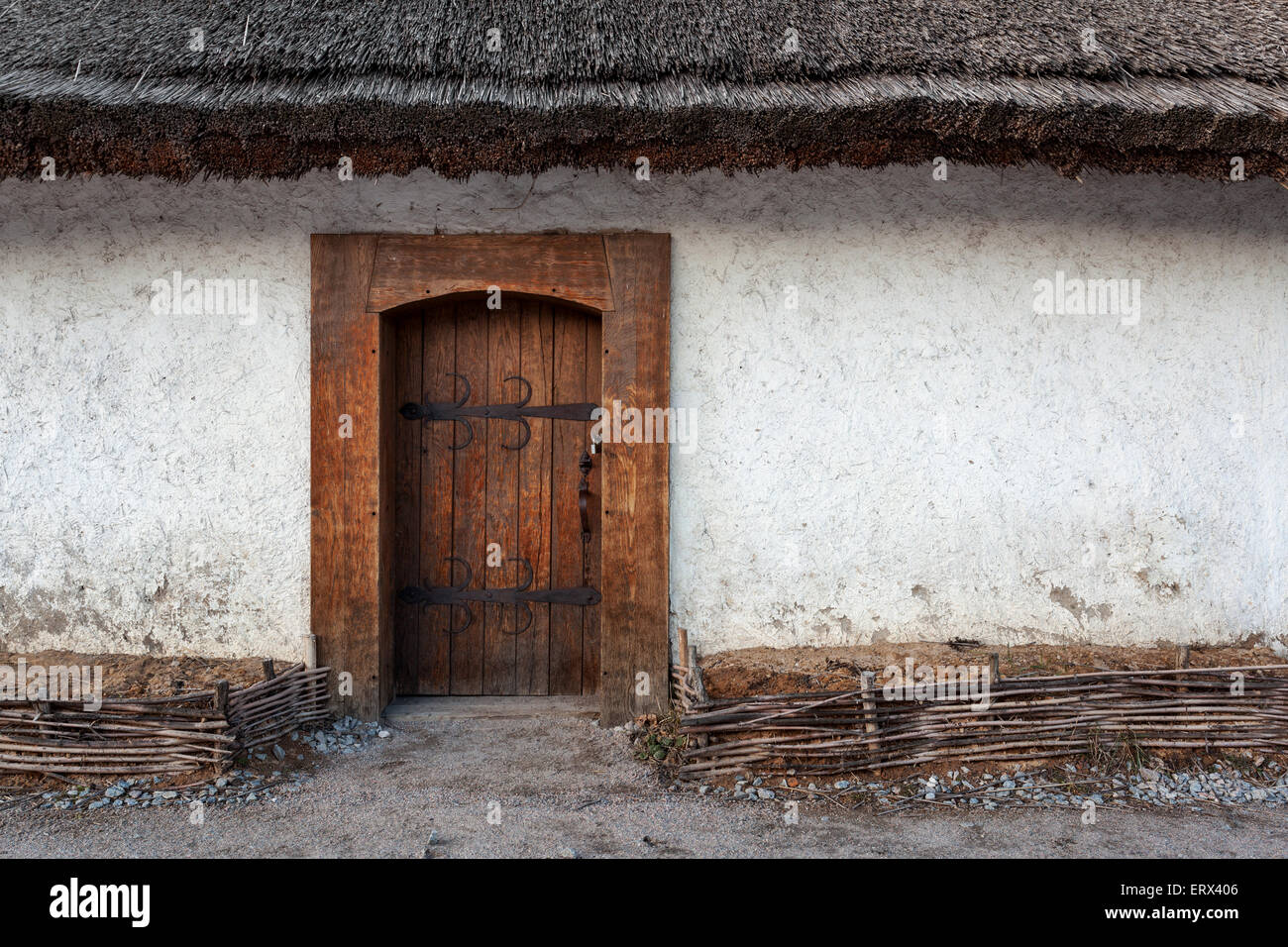 Wooden old door with lock and clay wall. Background for design Stock ...