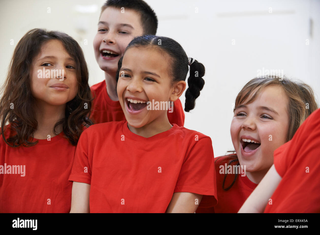 Group Of Children Enjoying Drama Class Together Stock Photo - Alamy