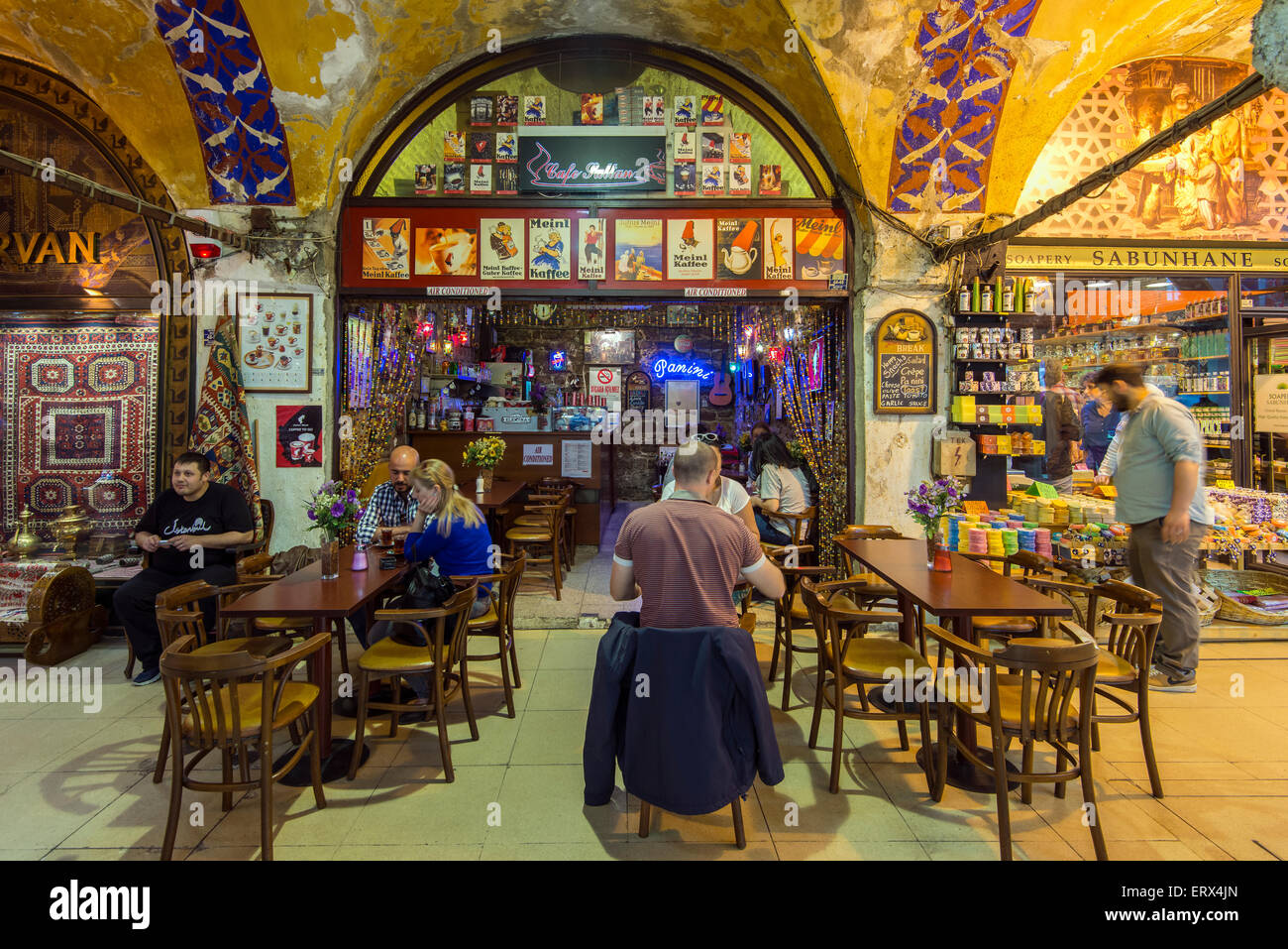 Cafe with tourists seated at tables inside the Grand Bazaar ...