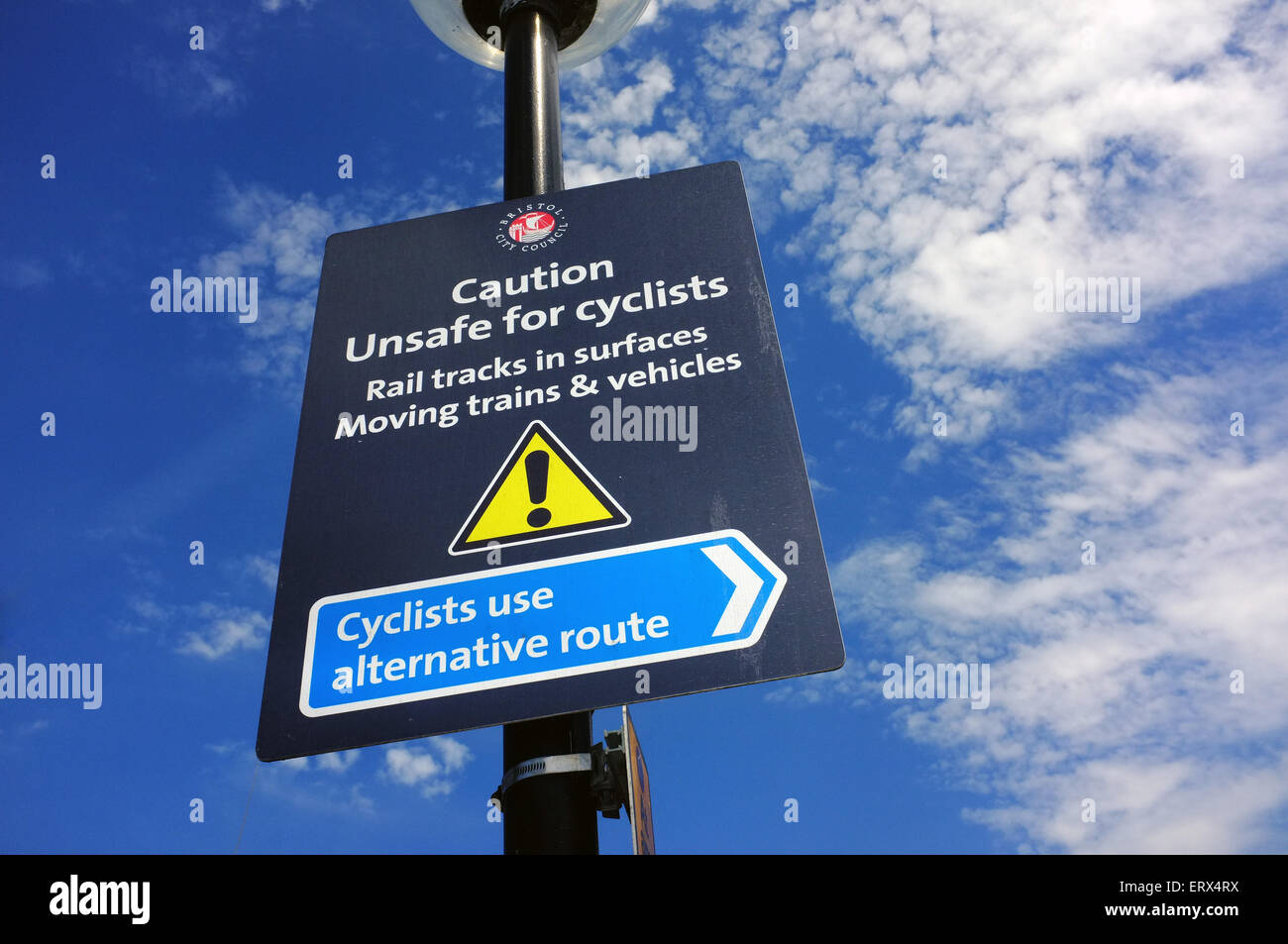 A caution sign for cyclists in Bristol Harbour in the UK Stock Photo ...