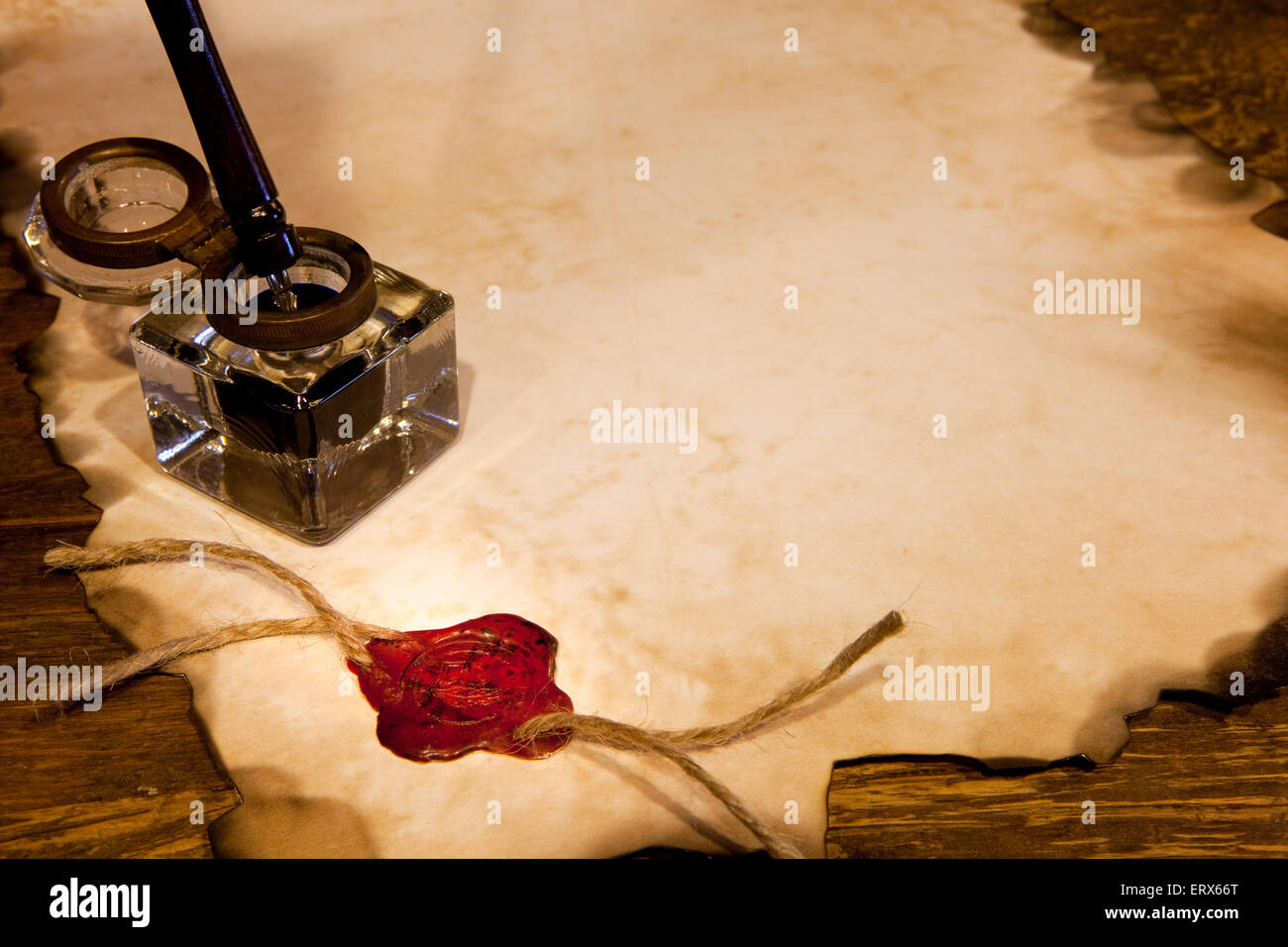 Old ink pot on a parchment scroll with wax seal Stock Photo - Alamy