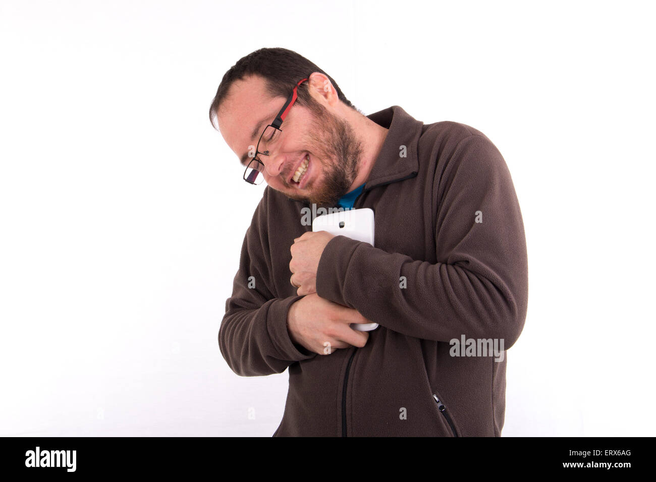man hugging his telephone isolated on white background Stock Photo - Alamy